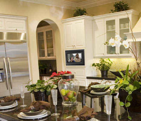 Kitchen cabinet hidden television